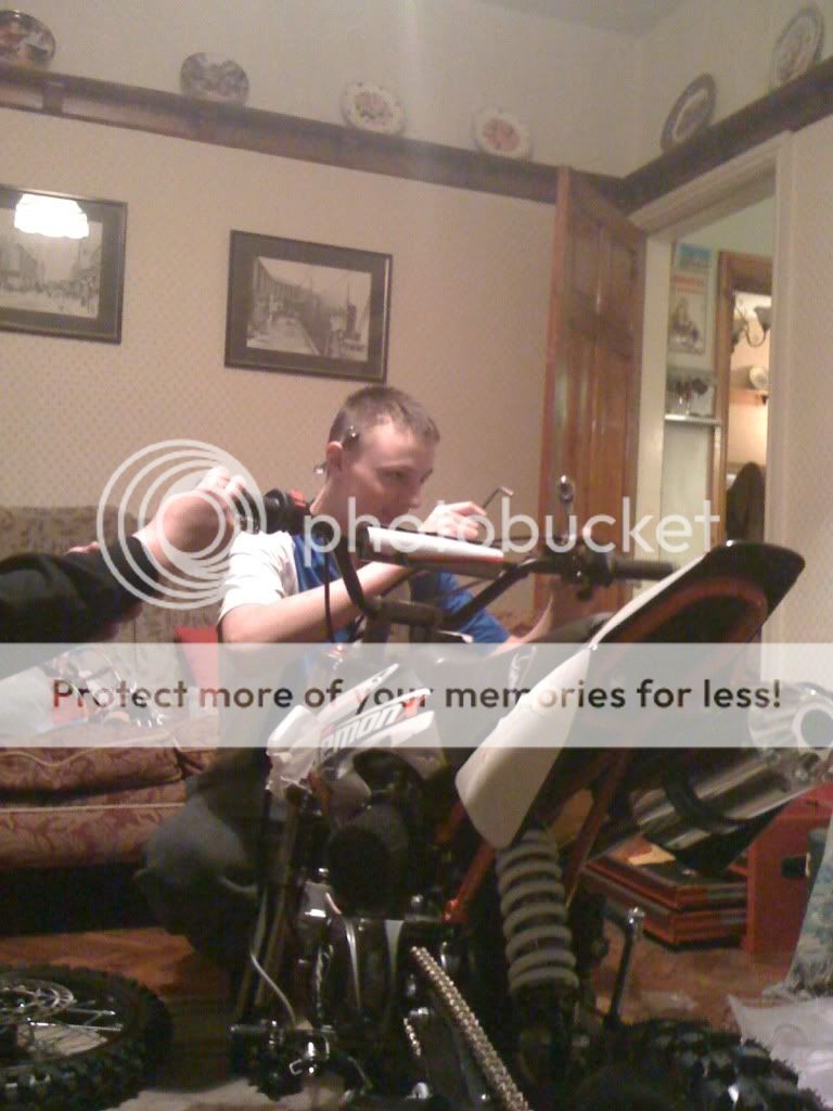 And heres me at work, keeping the 10mm spanner behind my ear obviously